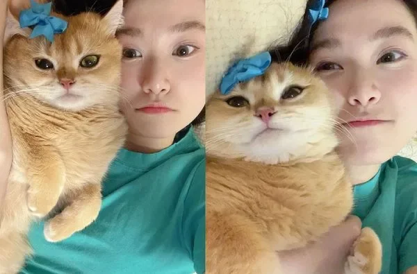 สาวจีนโพสต์รูปคู่กับแมวตัวโปรด หน้าตาเหมือนกันยันรอยยิ้ม จนกลายเป็นไวรัล!